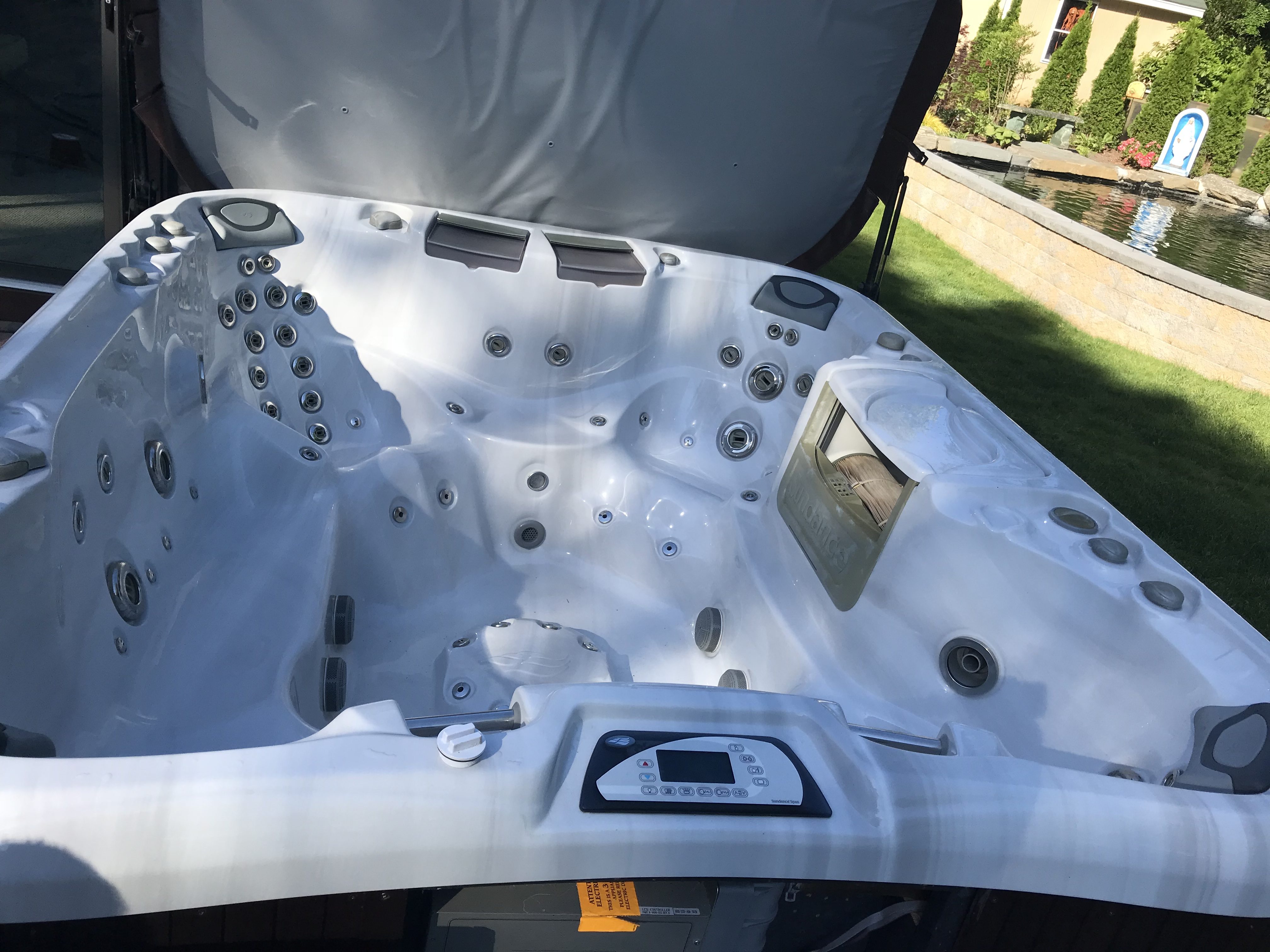 Sundance Aspen 880 with cover and step stool - Hot Tub Insider